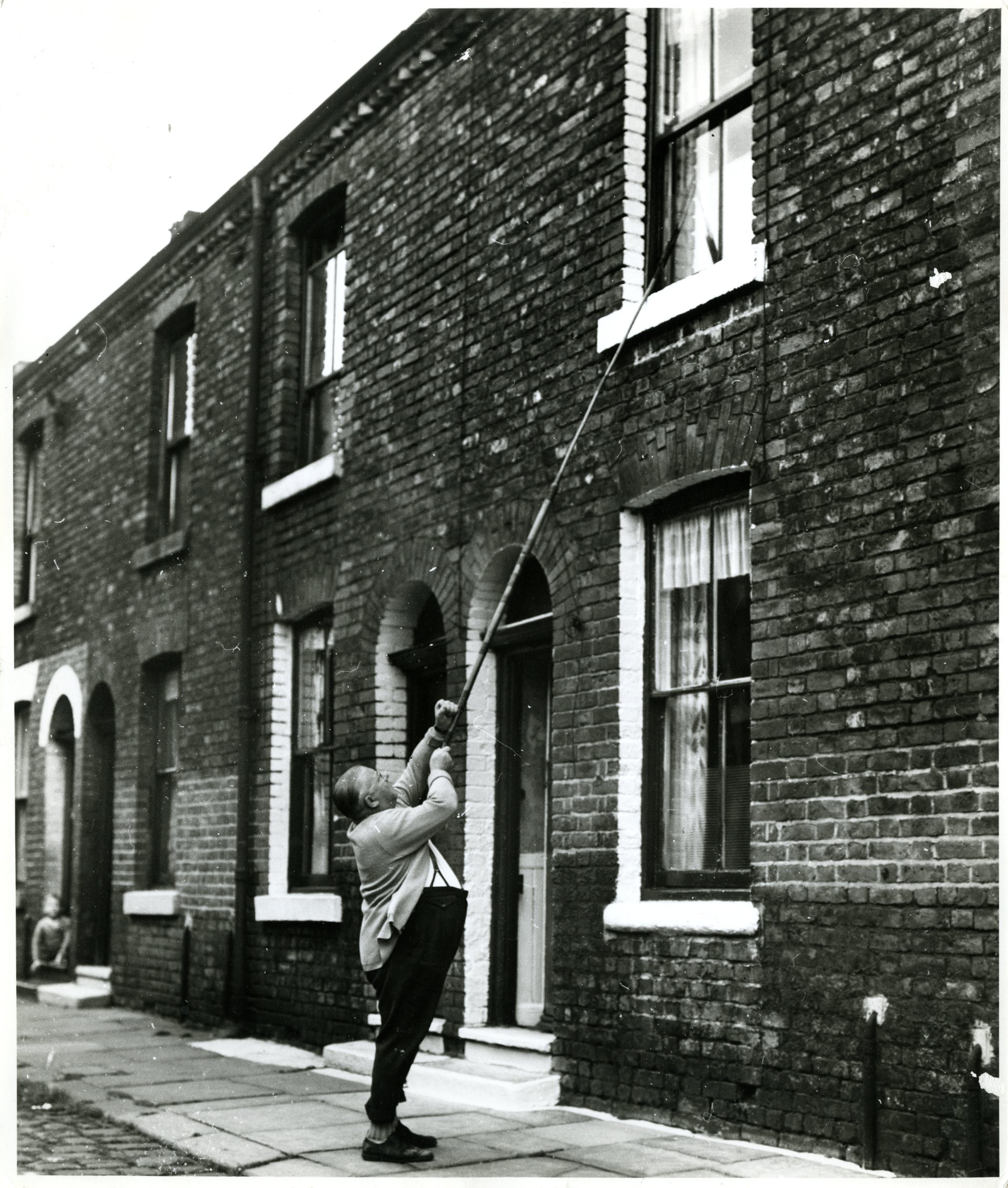 Wanted: Knocker-upper of Salford (1950s-1960s) - The Modern Backdrop